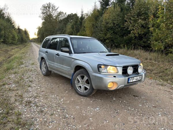Pelēks Subaru Forester 2003 Valmiera, ar dzinēja tilpumu 2.00 L un nobraukumu 356 tūkst. km par 2500 €, foto 3 vietnē AUTOMOTO.COM.LV