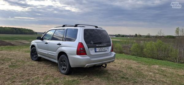 Grey Subaru Forester 2004 in Panevezys, with an engine capacity of 2.00 L and mileage of 267 thousand km for 2800 €, photo 3 on AUTOMOTO.COM.LV
