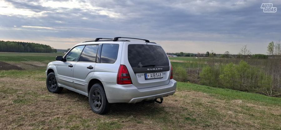 Grey Subaru Forester 2004 in Panevezys, with an engine capacity of 2.00 L and mileage of 267 thousand km for 2800 €, photo 4 on AUTOMOTO.COM.LV
