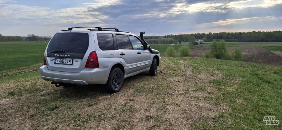 Grey Subaru Forester 2004 in Panevezys, with an engine capacity of 2.00 L and mileage of 267 thousand km for 2800 €, photo 5 on AUTOMOTO.COM.LV