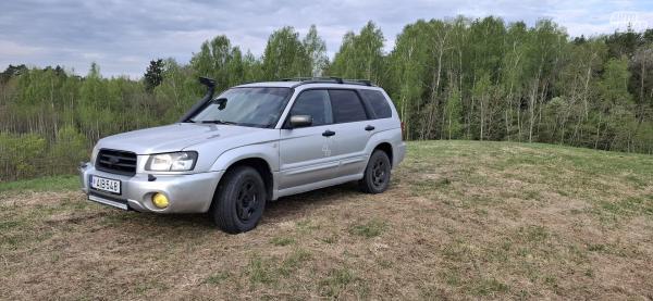 Grey Subaru Forester 2004 in Panevezys, with an engine capacity of 2.00 L and mileage of 267 thousand km for 2650 €, photo 2 on AUTOMOTO.COM.LV
