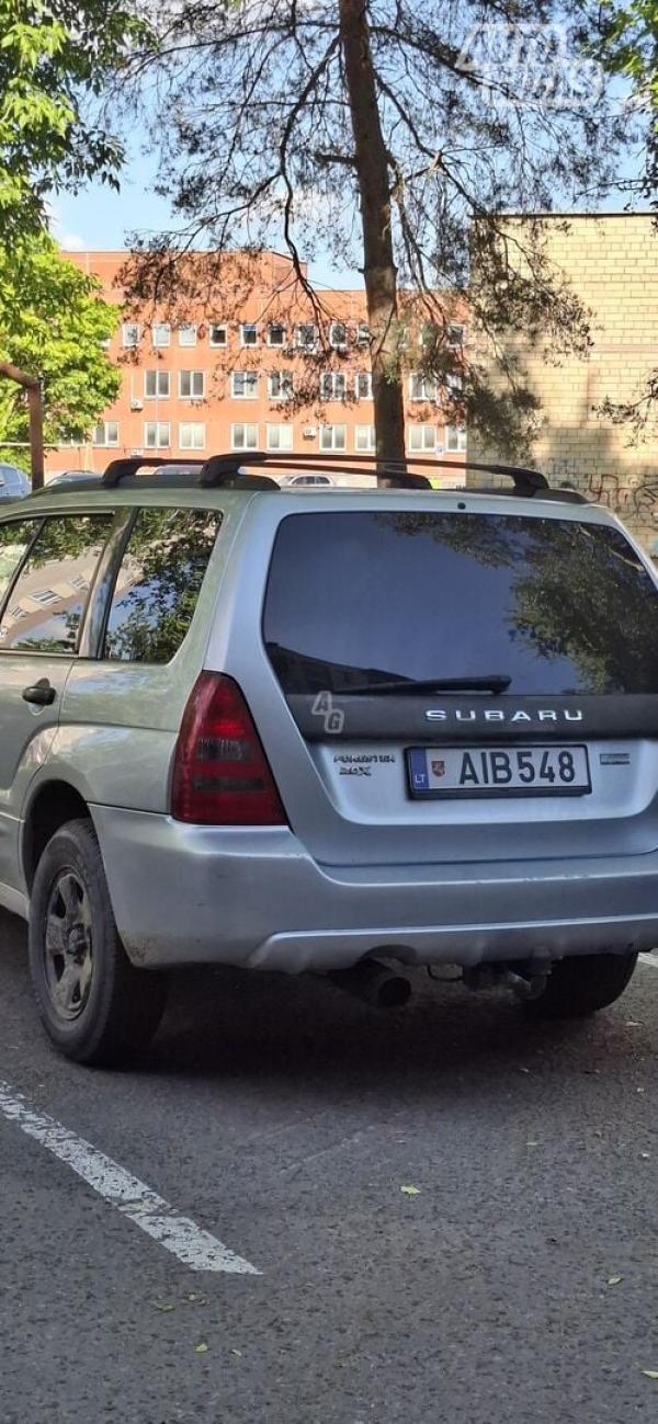 Grey Subaru Forester 2004 in Panevezys, with an engine capacity of 2.00 L and mileage of 267 thousand km for 2650 €, photo 6 on AUTOMOTO.COM.LV