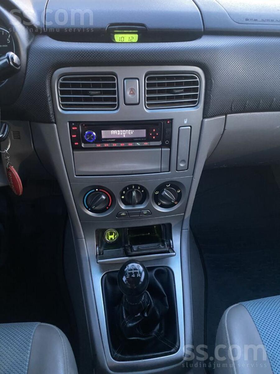 Grey Subaru Forester 2004 in Riga, with an engine capacity of 2.00 L and mileage of 317 thousand km for 2200 €, photo 11 on AUTOMOTO.COM.LV