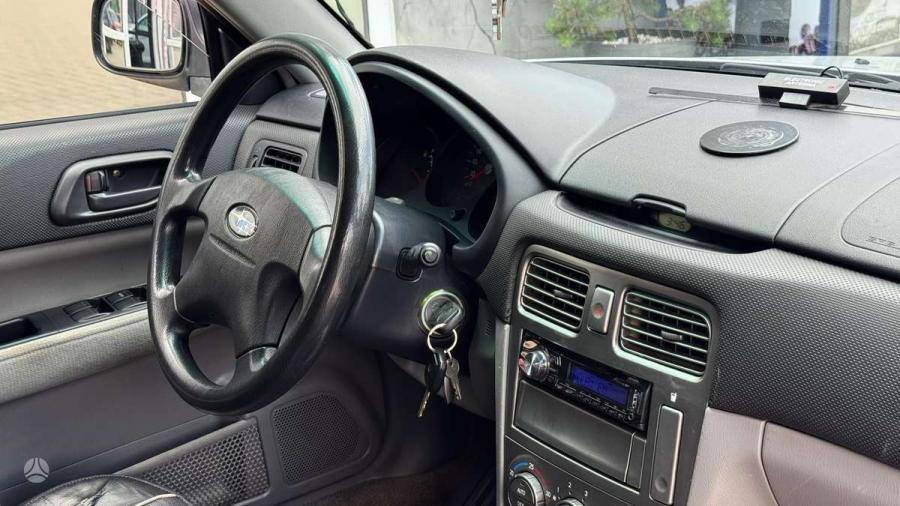 Pelēks Subaru Forester 2004 Radviliškis, ar dzinēja tilpumu 2.00 L un nobraukumu 400 tūkst. km par 4650 €, foto 19 vietnē AUTOMOTO.COM.LV