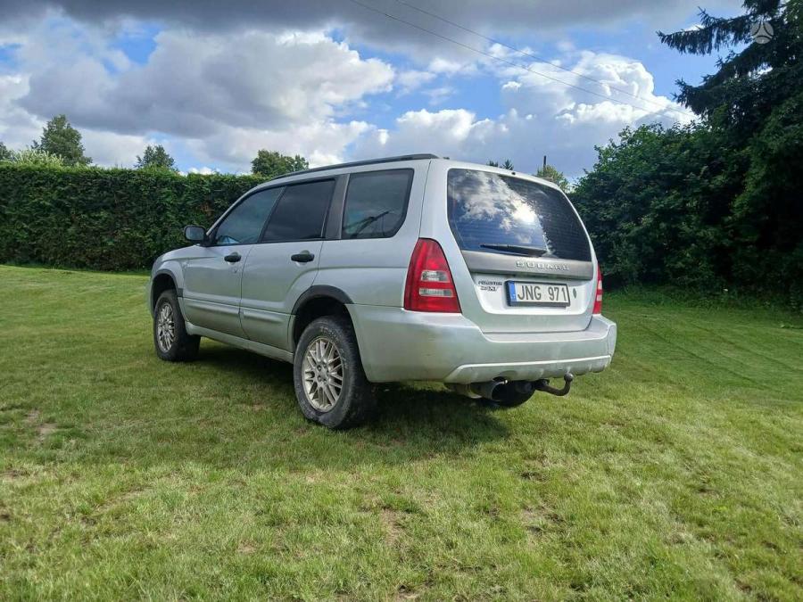 Pelēks Subaru Forester 2004 Anykščiai, ar dzinēja tilpumu 2.46 L un nobraukumu 375 tūkst. km par 4300 €, foto 6 vietnē AUTOMOTO.COM.LV