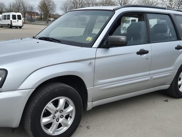 Grey Subaru Forester 2005 in Siauliai, with an engine capacity of 2.00 L and mileage of 20 thousand km for 3550 €, photo 6 on AUTOMOTO.COM.LV