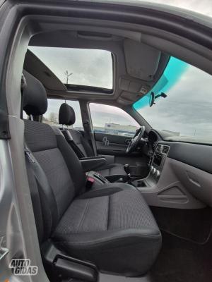 Pelēks Subaru Forester 2005 Šauļi, ar dzinēja tilpumu 2.00 L un nobraukumu 20 tūkst. km par 3550 €, foto 19 vietnē AUTOMOTO.COM.LV