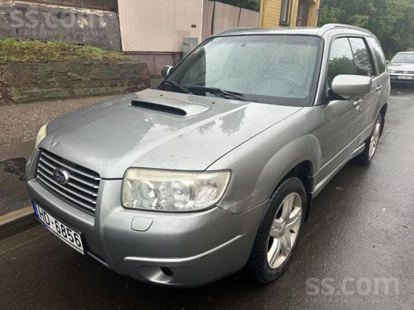 Pelēks Subaru Forester 2006 Rīga, ar dzinēja tilpumu 2.50 L un nobraukumu 378 tūkst. km par 1650 €, foto 1 vietnē AUTOMOTO.COM.LV