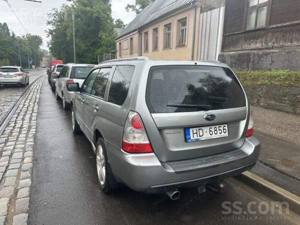 Pelēks Subaru Forester 2006 Rīga, ar dzinēja tilpumu 2.50 L un nobraukumu 378 tūkst. km par 1650 €, foto 2 vietnē AUTOMOTO.COM.LV