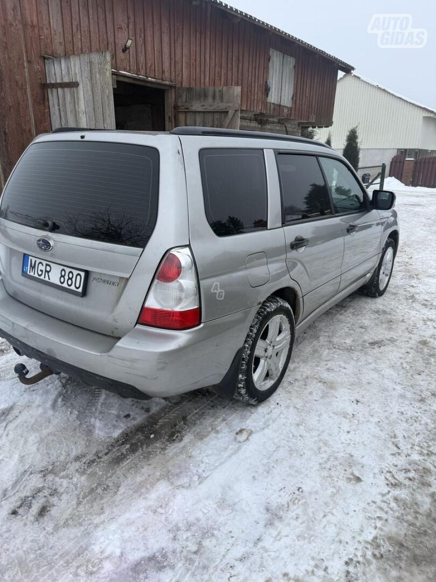 Pelēks Subaru Forester 2006 Tauragė, ar dzinēja tilpumu 2.50 L un nobraukumu 300 tūkst. km par 2000 €, foto 5 vietnē AUTOMOTO.COM.LV