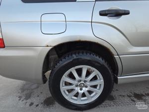 Pelēks Subaru Forester 2006 Naujoji Akmenė, ar dzinēja tilpumu 2.00 L un nobraukumu 227 tūkst. km par 2400 €, foto 7 vietnē AUTOMOTO.COM.LV