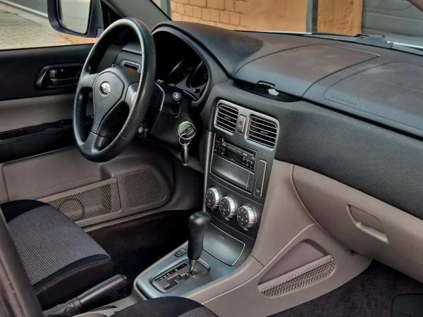 Pelēks Subaru Forester 2006 Rīga, ar dzinēja tilpumu 2.00 L un nobraukumu 79 tūkst. km par 4290 €, foto 8 vietnē AUTOMOTO.COM.LV