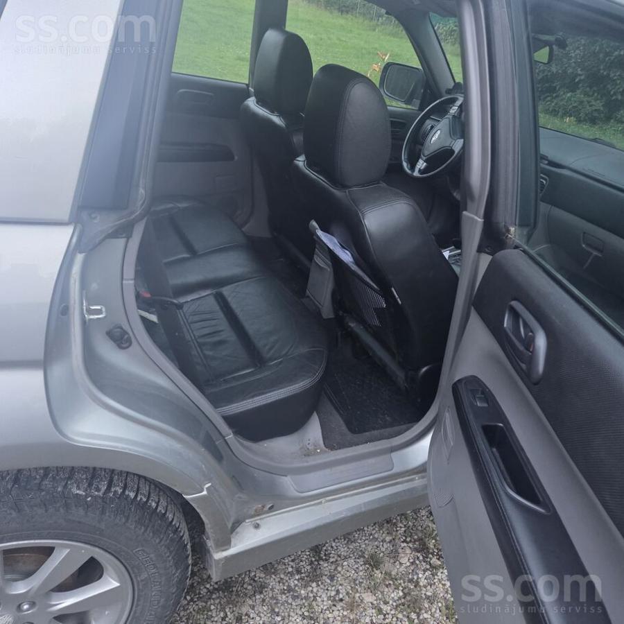 Grey Subaru Forester 2006 in Jekabpils, with an engine capacity of 2.00 L and mileage of 217 thousand km for 2700 €, photo 5 on AUTOMOTO.COM.LV