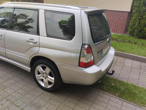 Grey Subaru Forester 2006 in Silute, with an engine capacity of 2.50 L and mileage of 225 thousand km for 5300 €, photo 7 on AUTOMOTO.COM.LV