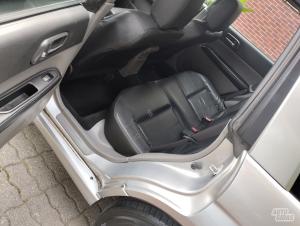 Grey Subaru Forester 2006 in Silute, with an engine capacity of 2.50 L and mileage of 225 thousand km for 5300 €, photo 13 on AUTOMOTO.COM.LV