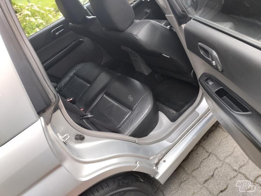Grey Subaru Forester 2006 in Silute, with an engine capacity of 2.50 L and mileage of 225 thousand km for 5300 €, photo 14 on AUTOMOTO.COM.LV