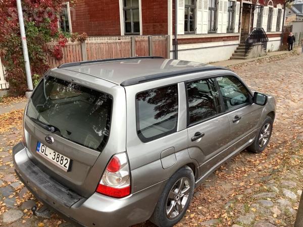 Pelēks Subaru Forester 2007 Rīga, ar dzinēja tilpumu 2.00 L un nobraukumu 246 tūkst. km par 3250 €, foto 5 vietnē AUTOMOTO.COM.LV