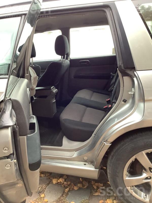 Pelēks Subaru Forester 2007 Rīga, ar dzinēja tilpumu 2.00 L un nobraukumu 246 tūkst. km par 3250 €, foto 6 vietnē AUTOMOTO.COM.LV