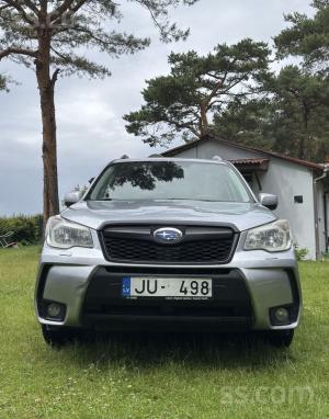 Grey Subaru Forester 2013 in Riga, with an engine capacity of 2.00 L and mileage of 200 thousand km for 9500 €, photo 3 on AUTOMOTO.COM.LV