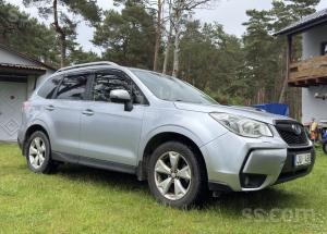 Grey Subaru Forester 2013 in Riga, with an engine capacity of 2.00 L and mileage of 200 thousand km for 9500 €, photo 4 on AUTOMOTO.COM.LV