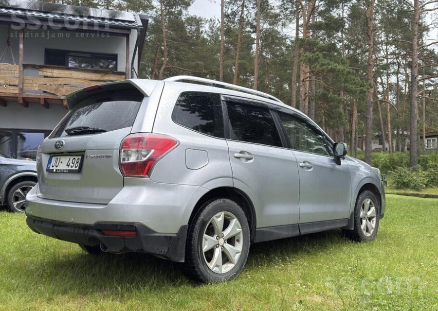 Grey Subaru Forester 2013 in Riga, with an engine capacity of 2.00 L and mileage of 200 thousand km for 9500 €, photo 5 on AUTOMOTO.COM.LV