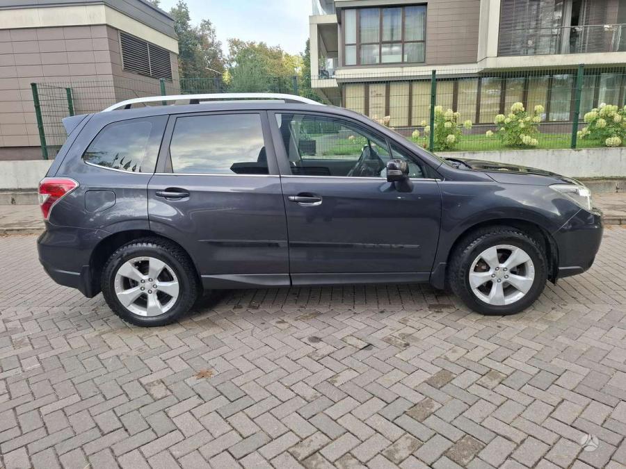 Grey Subaru Forester 2014 in Vilnius, with an engine capacity of 2.00 L and mileage of 236 thousand km for 7400 €, photo 5 on AUTOMOTO.COM.LV