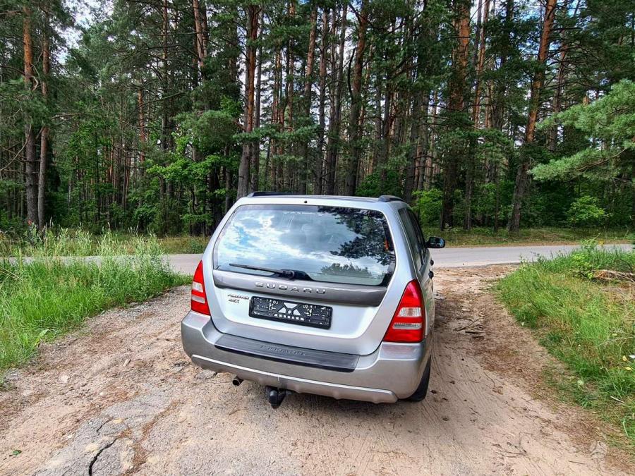 Pelēks Subaru Forester 2004 Viļņa, ar dzinēja tilpumu 2.00 L un nobraukumu 256 tūkst. km par 2750 €, foto 5 vietnē AUTOMOTO.COM.LV