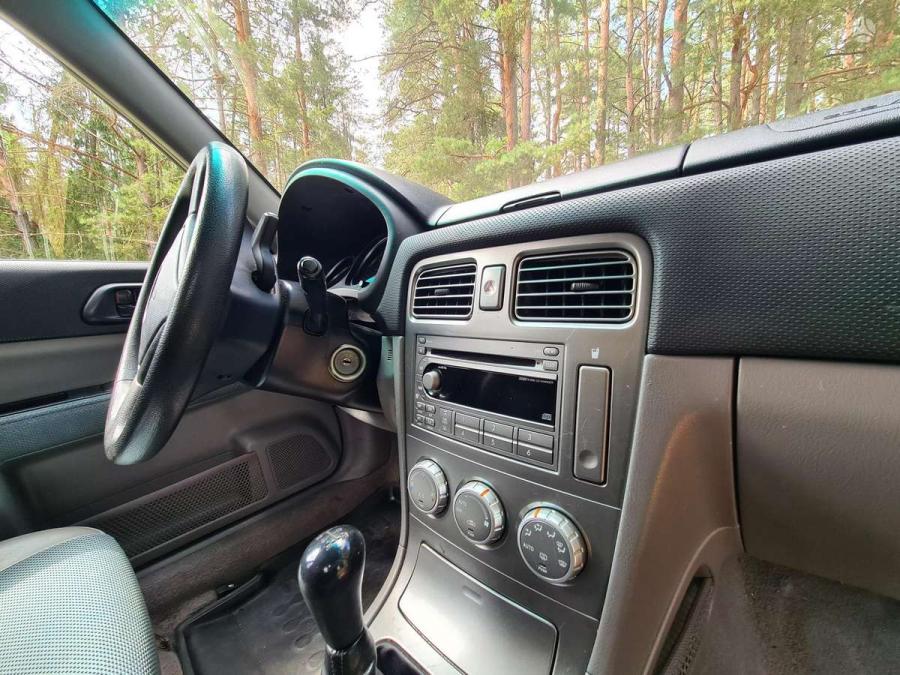 Pelēks Subaru Forester 2004 Viļņa, ar dzinēja tilpumu 2.00 L un nobraukumu 256 tūkst. km par 2750 €, foto 11 vietnē AUTOMOTO.COM.LV