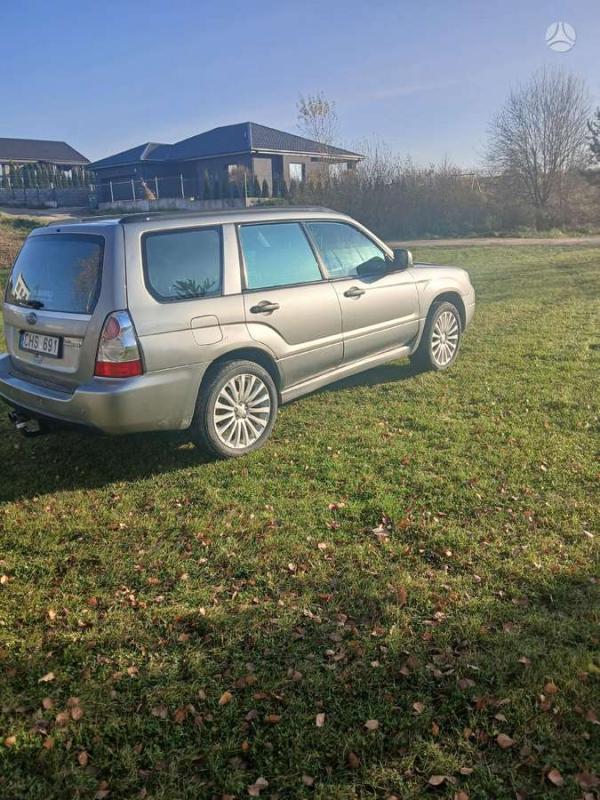 Pelēks Subaru Forester 2008 Viļņa, ar dzinēja tilpumu 2.00 L un nobraukumu 262 tūkst. km par 2600 €, foto 7 vietnē AUTOMOTO.COM.LV