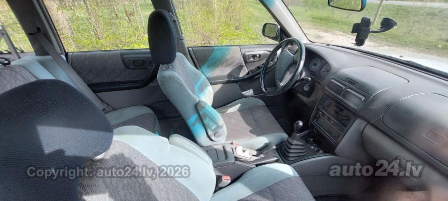 Pelēks Subaru Forester 1999 Tallina, ar dzinēja tilpumu 2.00 L un nobraukumu 350 tūkst. km par 1627 €, foto 9 vietnē AUTOMOTO.COM.LV
