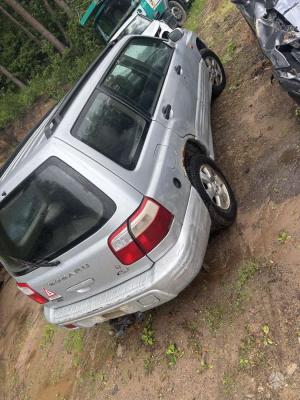 Pelēks Subaru Forester 2002 Kauņa, ar dzinēja tilpumu 2.00 L un nobraukumu 320 tūkst. km par 450 €, foto 5 vietnē AUTOMOTO.COM.LV