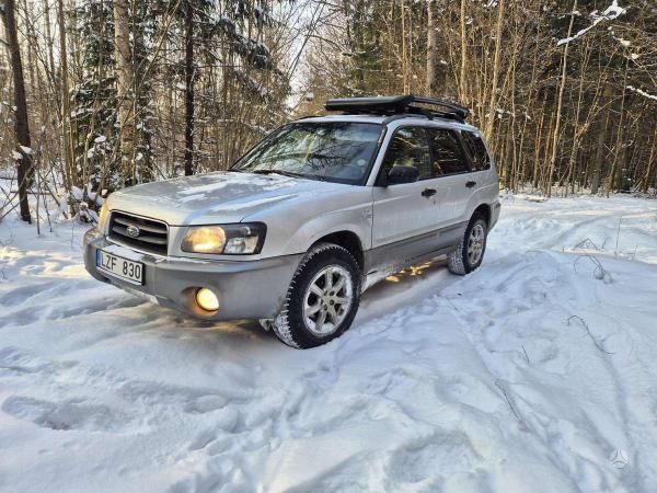 Pelēks Subaru Forester 2003 Marijampole, ar dzinēja tilpumu 2.00 L un nobraukumu 400 tūkst. km par 3200 €, foto 6 vietnē AUTOMOTO.COM.LV
