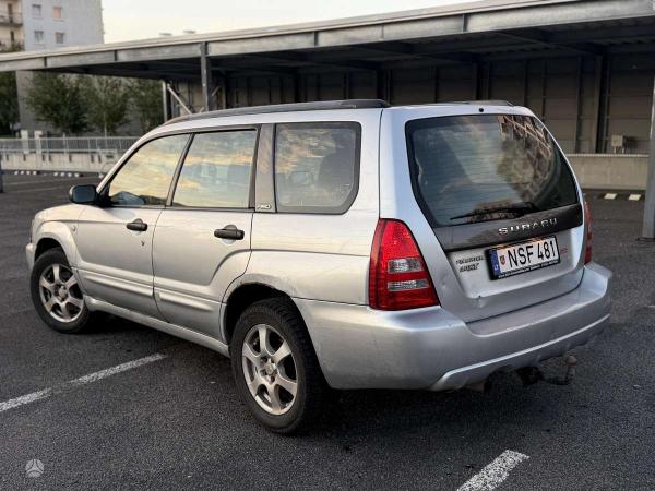 Pelēks Subaru Forester 2004 Viļņa, ar dzinēja tilpumu 1.99 L un nobraukumu 224 tūkst. km par 2900 €, foto 6 vietnē AUTOMOTO.COM.LV