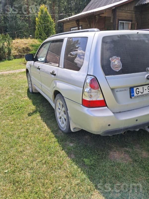 Grey Subaru Forester 2007 in Riga, with an engine capacity of 2.00 L and mileage of 423 thousand km for 2100 €, photo 4 on AUTOMOTO.COM.LV