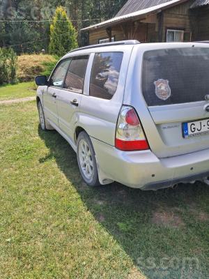 Pelēks Subaru Forester 2007 Rīga, ar dzinēja tilpumu 2.00 L un nobraukumu 423 tūkst. km par 2100 €, foto 5 vietnē AUTOMOTO.COM.LV