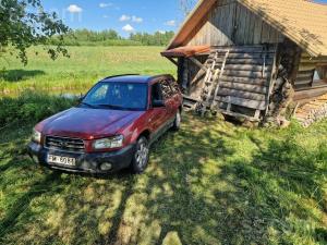 Sarkans Subaru Forester 2005 Rīga, ar dzinēja tilpumu 2.00 L un nobraukumu 0 tūkst. km par 2800 €, foto  vietnē AUTOMOTO.COM.LV