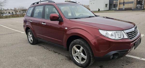 Red Subaru Forester 2009 in Ukmerge, with an engine capacity of 2.00 L and mileage of 199 thousand km for 4700 €, photo 9 on AUTOMOTO.COM.LV