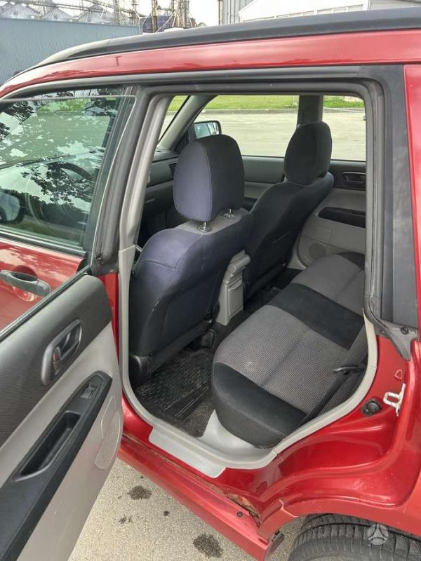 Red Subaru Forester 2007 in Joniskis, with an engine capacity of 1.99 L and mileage of 338 thousand km for 2500 €, photo 6 on AUTOMOTO.COM.LV