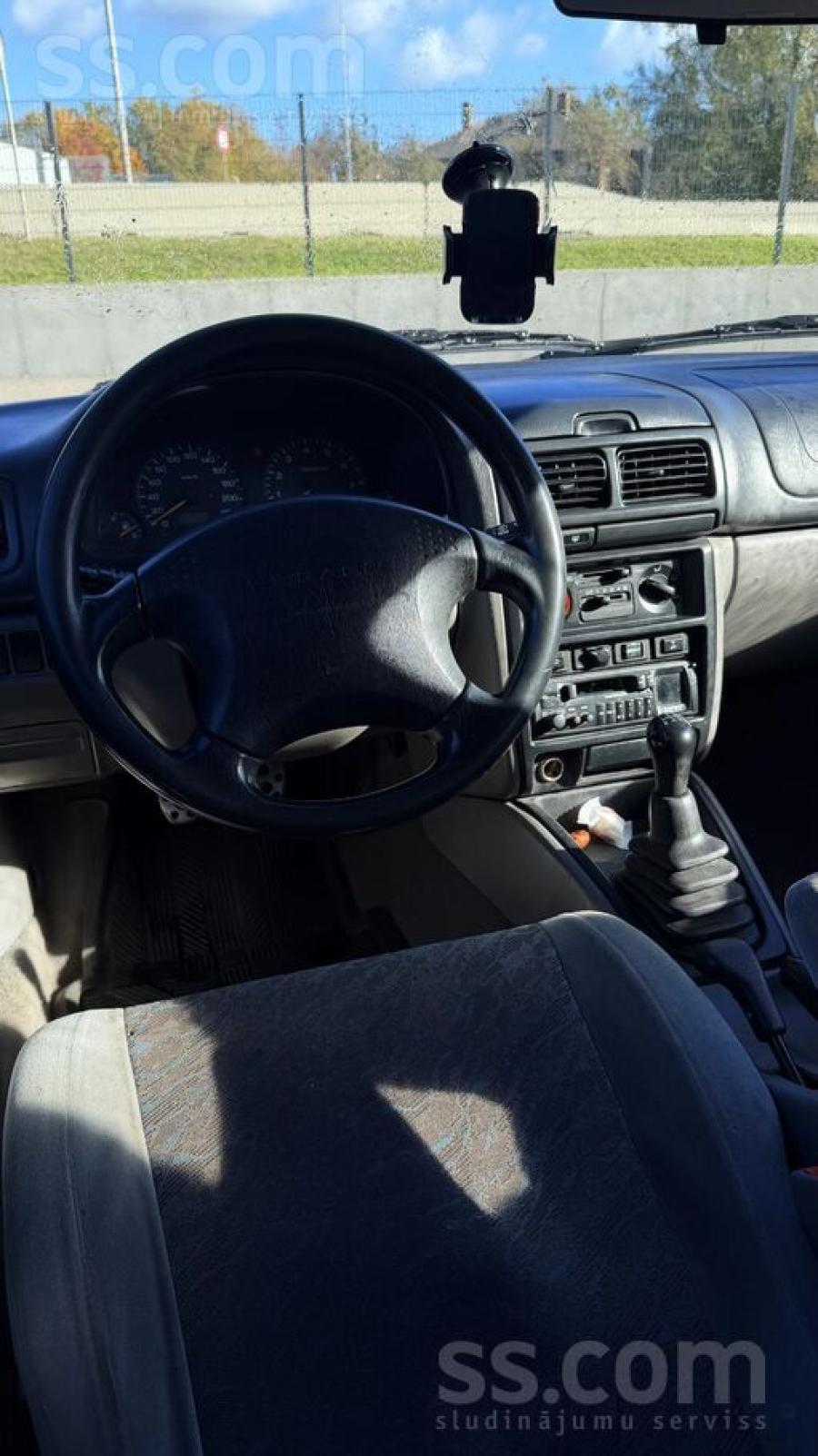 Red Subaru Forester 1998 in Riga, with an engine capacity of 2.00 L and mileage of 299 thousand km for 2250 €, photo 7 on AUTOMOTO.COM.LV