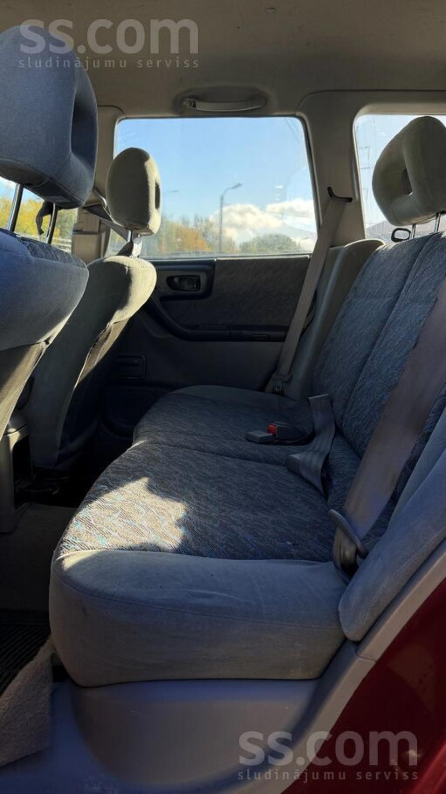 Red Subaru Forester 1998 in Riga, with an engine capacity of 2.00 L and mileage of 299 thousand km for 2250 €, photo 12 on AUTOMOTO.COM.LV