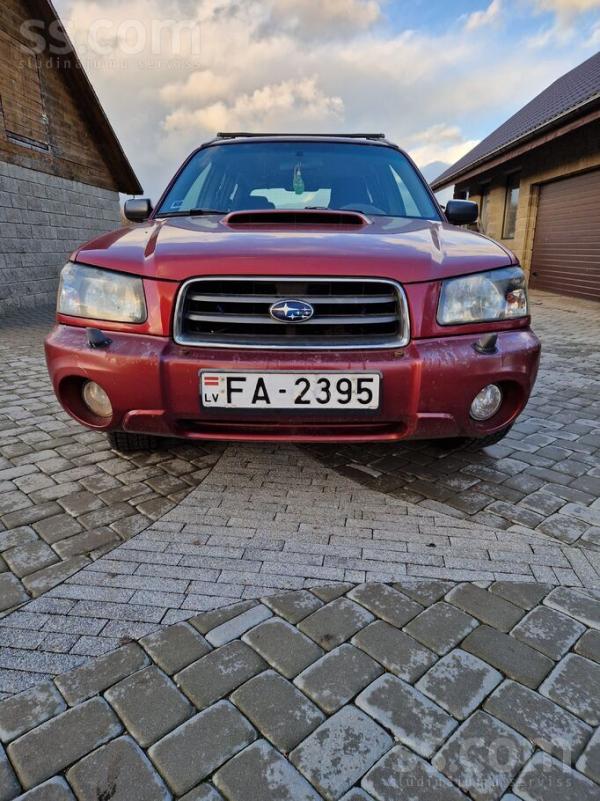 Red Subaru Forester 2003 in Talsi, with an engine capacity of 2.00 L and mileage of 305 thousand km for 1400 €, photo 1 on AUTOMOTO.COM.LV