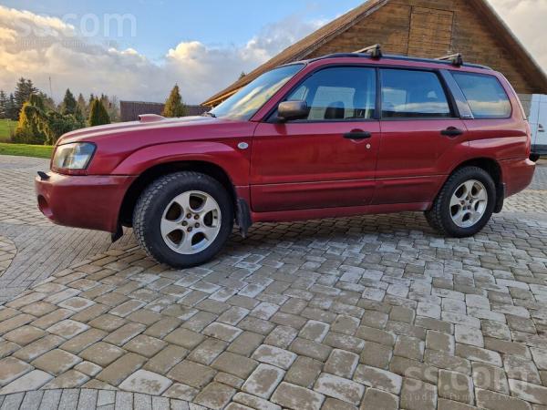 Red Subaru Forester 2003 in Talsi, with an engine capacity of 2.00 L and mileage of 305 thousand km for 1400 €, photo 2 on AUTOMOTO.COM.LV