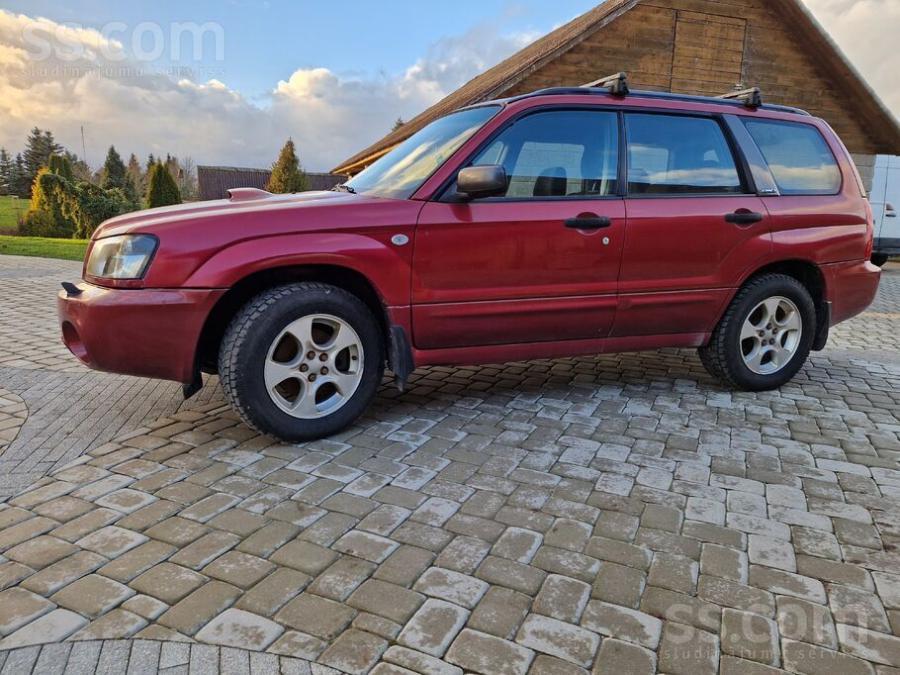 Red Subaru Forester 2003 in Talsi, with an engine capacity of 2.00 L and mileage of 305 thousand km for 1400 €, photo 2 on AUTOMOTO.COM.LV