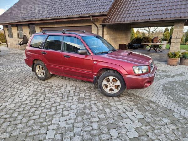 Red Subaru Forester 2003 in Talsi, with an engine capacity of 2.00 L and mileage of 305 thousand km for 1400 €, photo 3 on AUTOMOTO.COM.LV