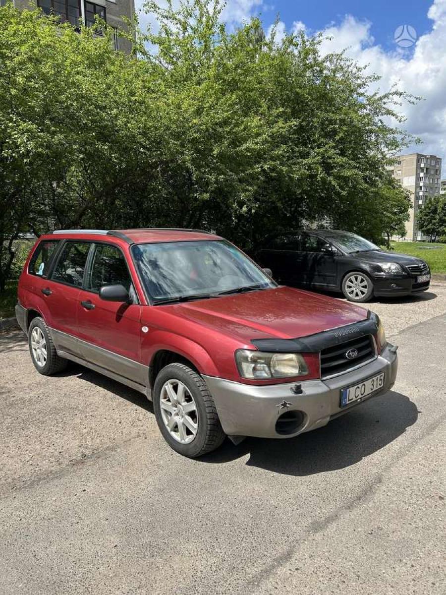 Sarkans Subaru Forester 2004 Viļņa, ar dzinēja tilpumu 2.00 L un nobraukumu 255 tūkst. km par 1450 €, foto 3 vietnē AUTOMOTO.COM.LV