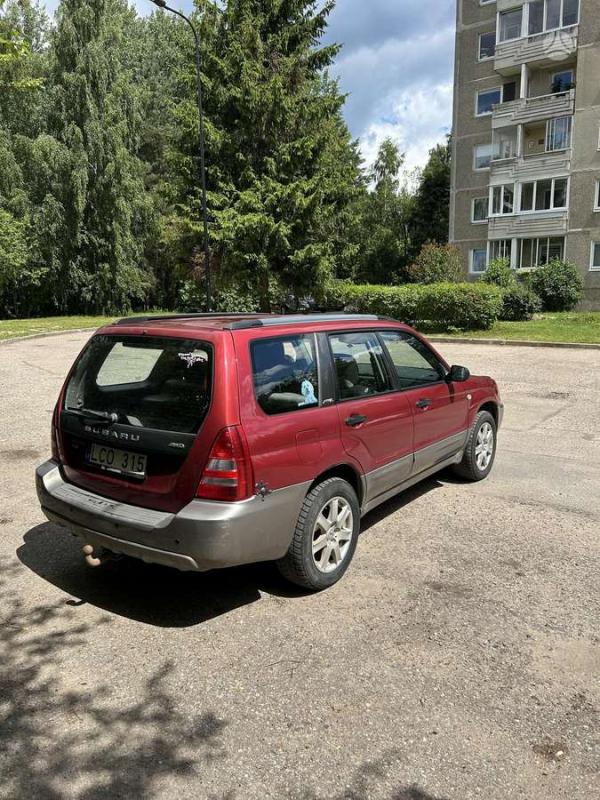 Sarkans Subaru Forester 2004 Viļņa, ar dzinēja tilpumu 2.00 L un nobraukumu 255 tūkst. km par 1450 €, foto 3 vietnē AUTOMOTO.COM.LV