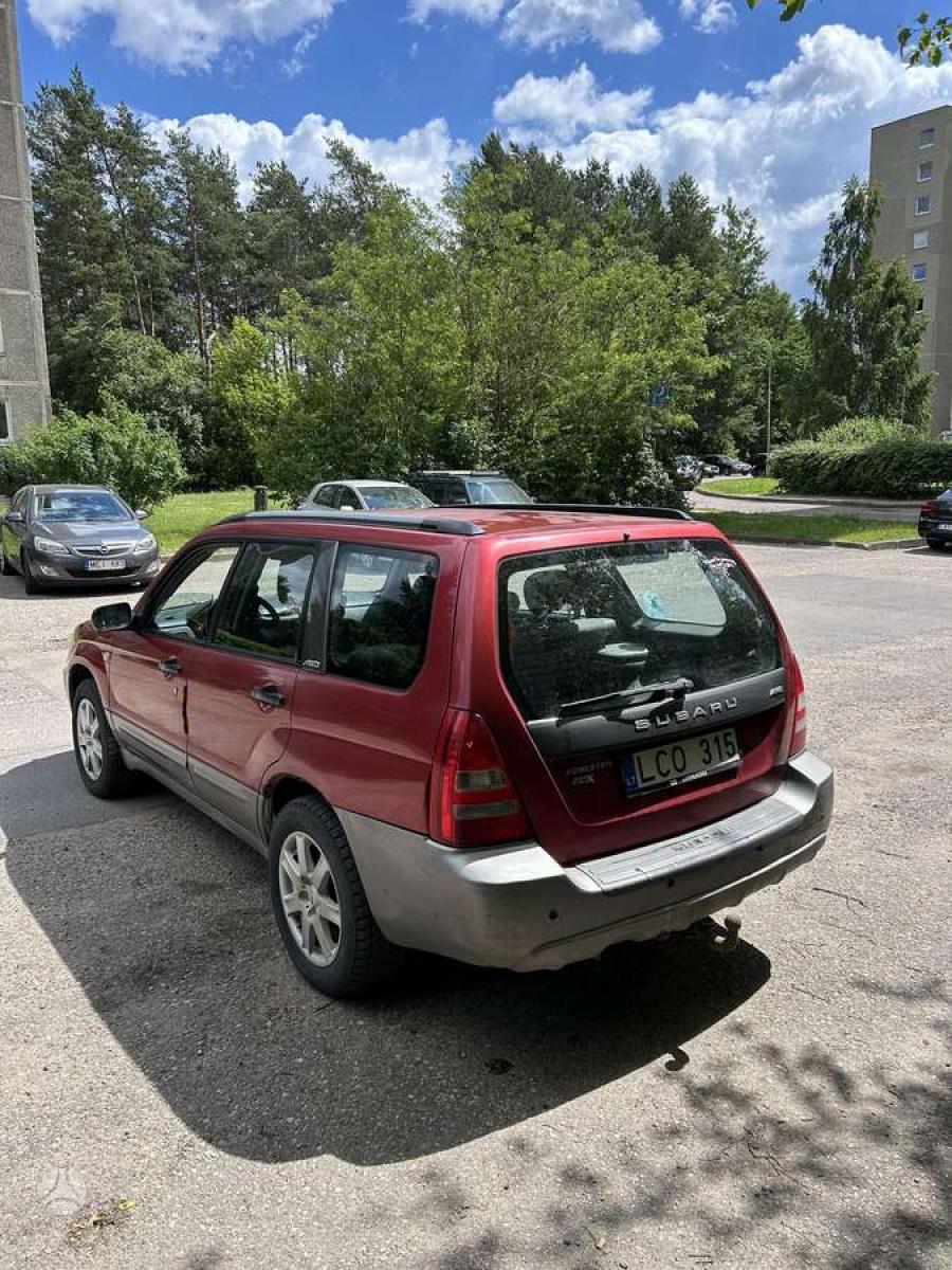 Sarkans Subaru Forester 2004 Viļņa, ar dzinēja tilpumu 2.00 L un nobraukumu 255 tūkst. km par 1450 €, foto 5 vietnē AUTOMOTO.COM.LV