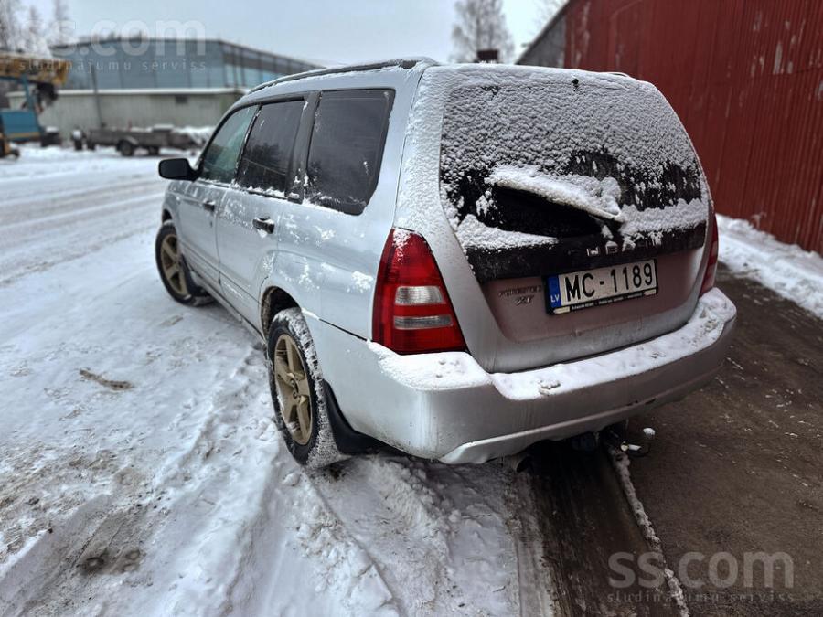 Subaru Forester 2003 in Riga, with an engine capacity of 2.00 L and mileage of 369 thousand km for 1890 €, photo 7 on AUTOMOTO.COM.LV
