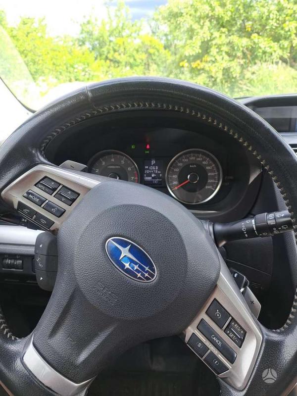 Violet Subaru Forester 2013 in Vilnius, with an engine capacity of 2.00 L and mileage of 205 thousand km for 7500 €, photo 10 on AUTOMOTO.COM.LV