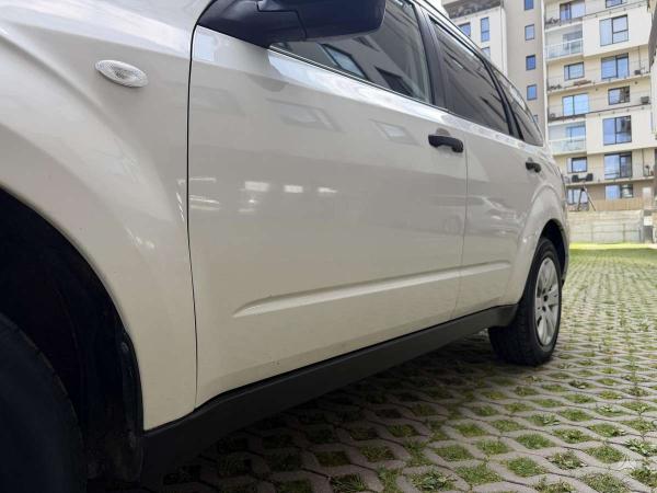 White Subaru Forester 2009 in Vilnius, with an engine capacity of 1.99 L and mileage of 251 thousand km for 4000 €, photo 11 on AUTOMOTO.COM.LV